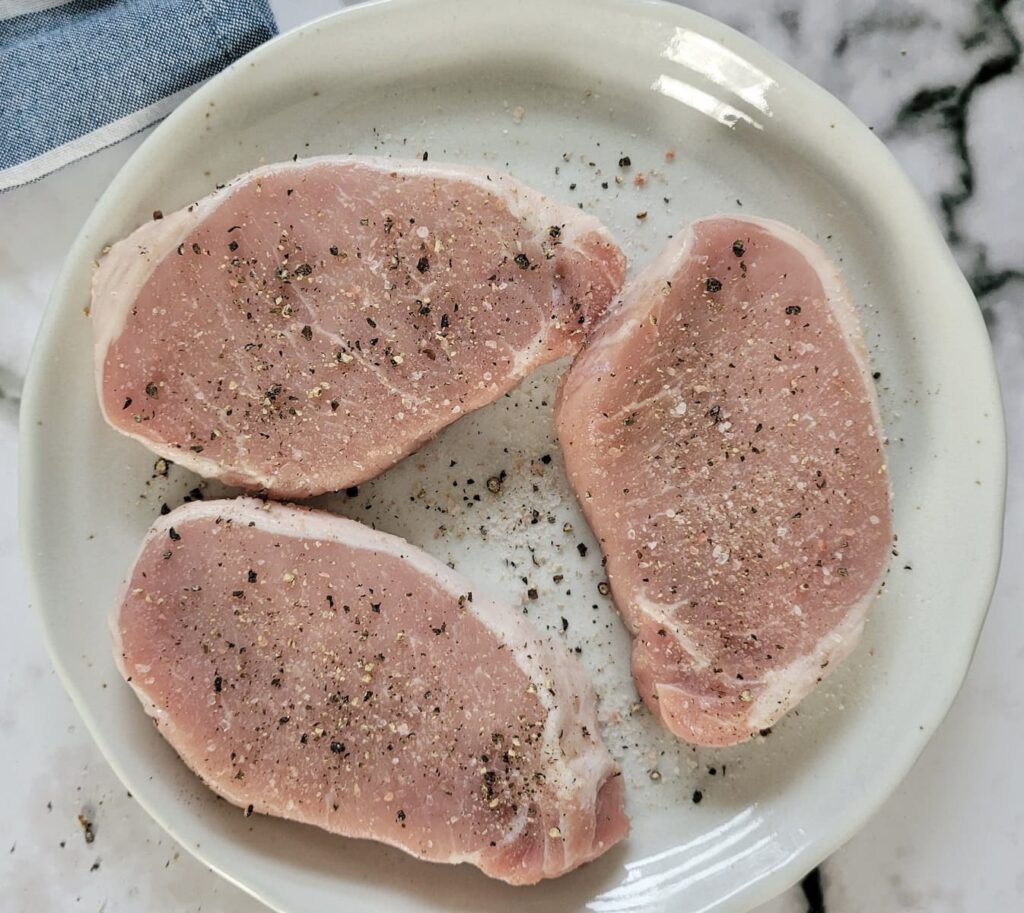 Creamy Pork Chops with Bacon and Spinach - Hip Hip Gourmet
